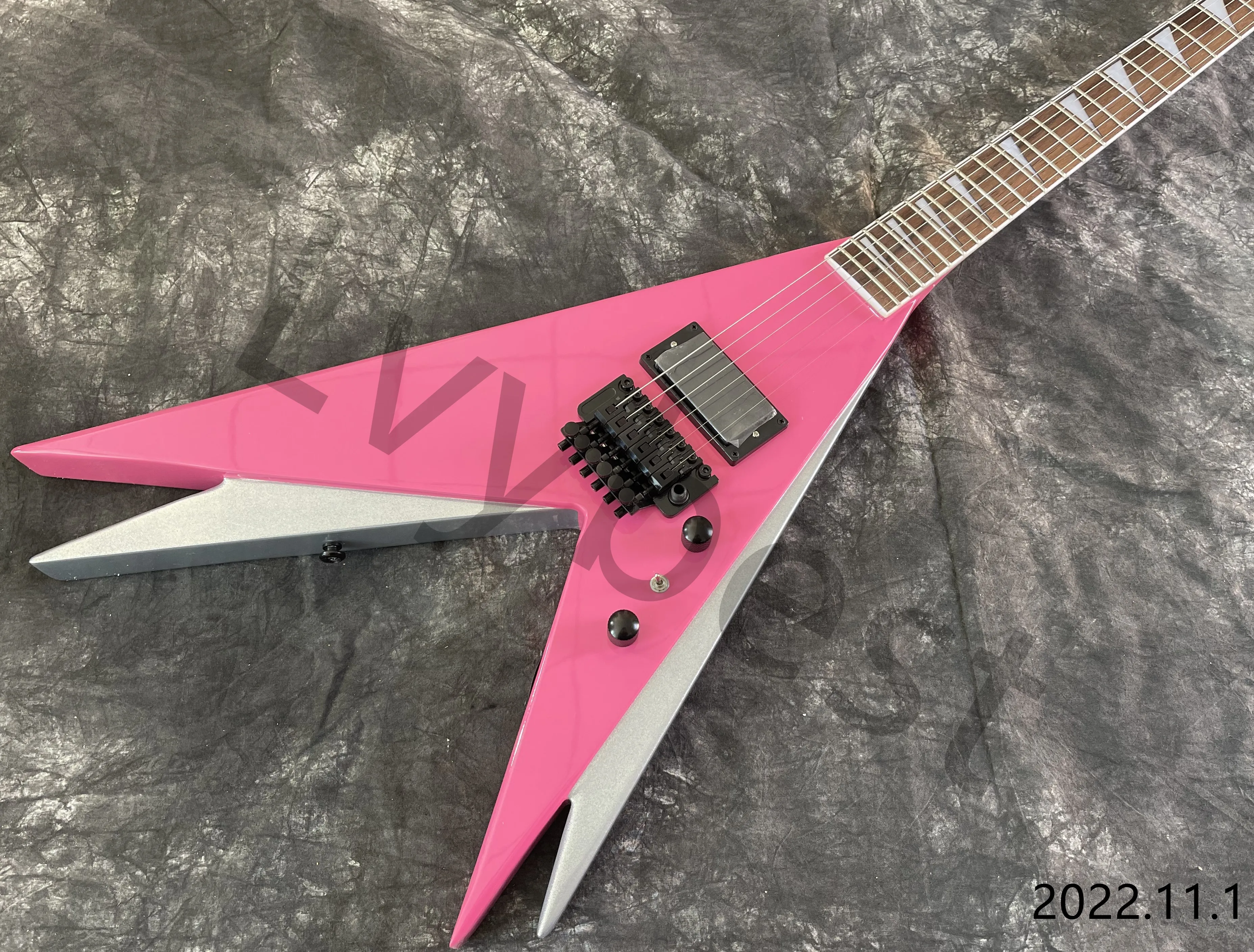 Pink And Black Electric Guitar