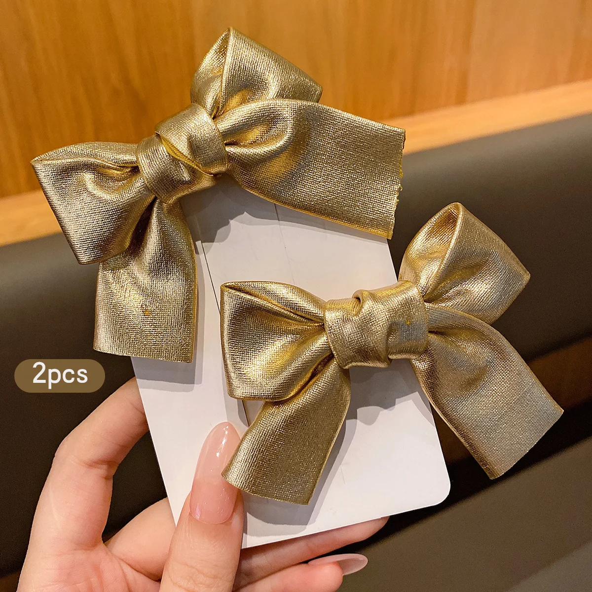 2 gold bow hair clips with elegant hair style suitable for daily use as ...
