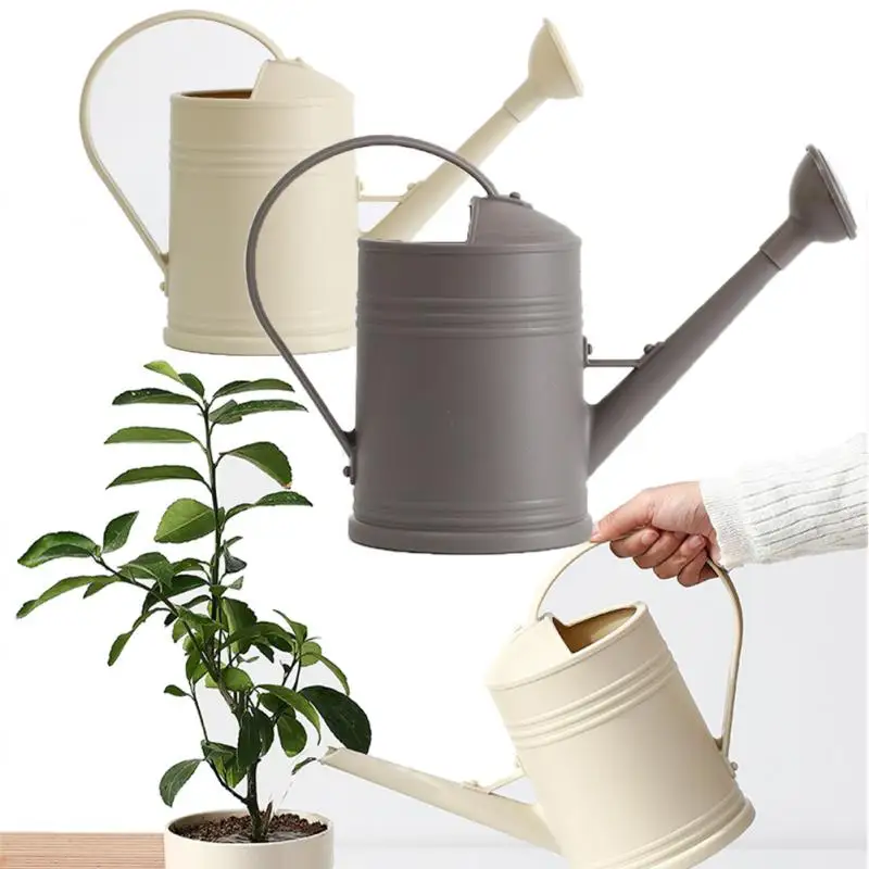 Manual Irrigation Using Buckets Or Watering Cans