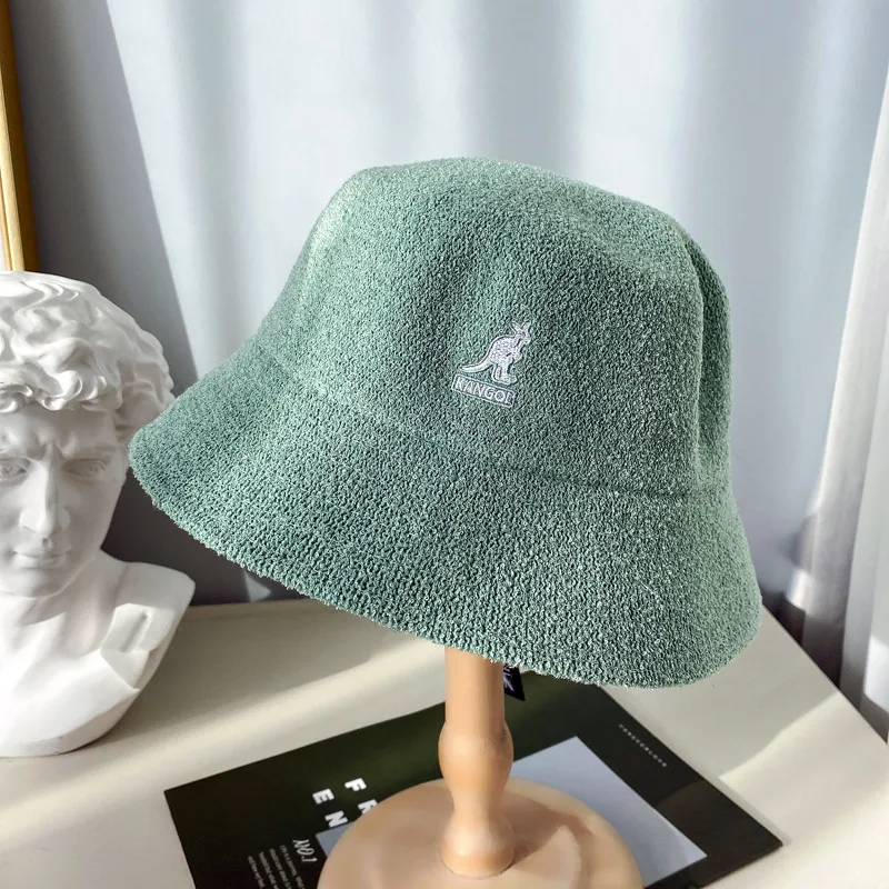 Wearing Kangol Bucket Hat