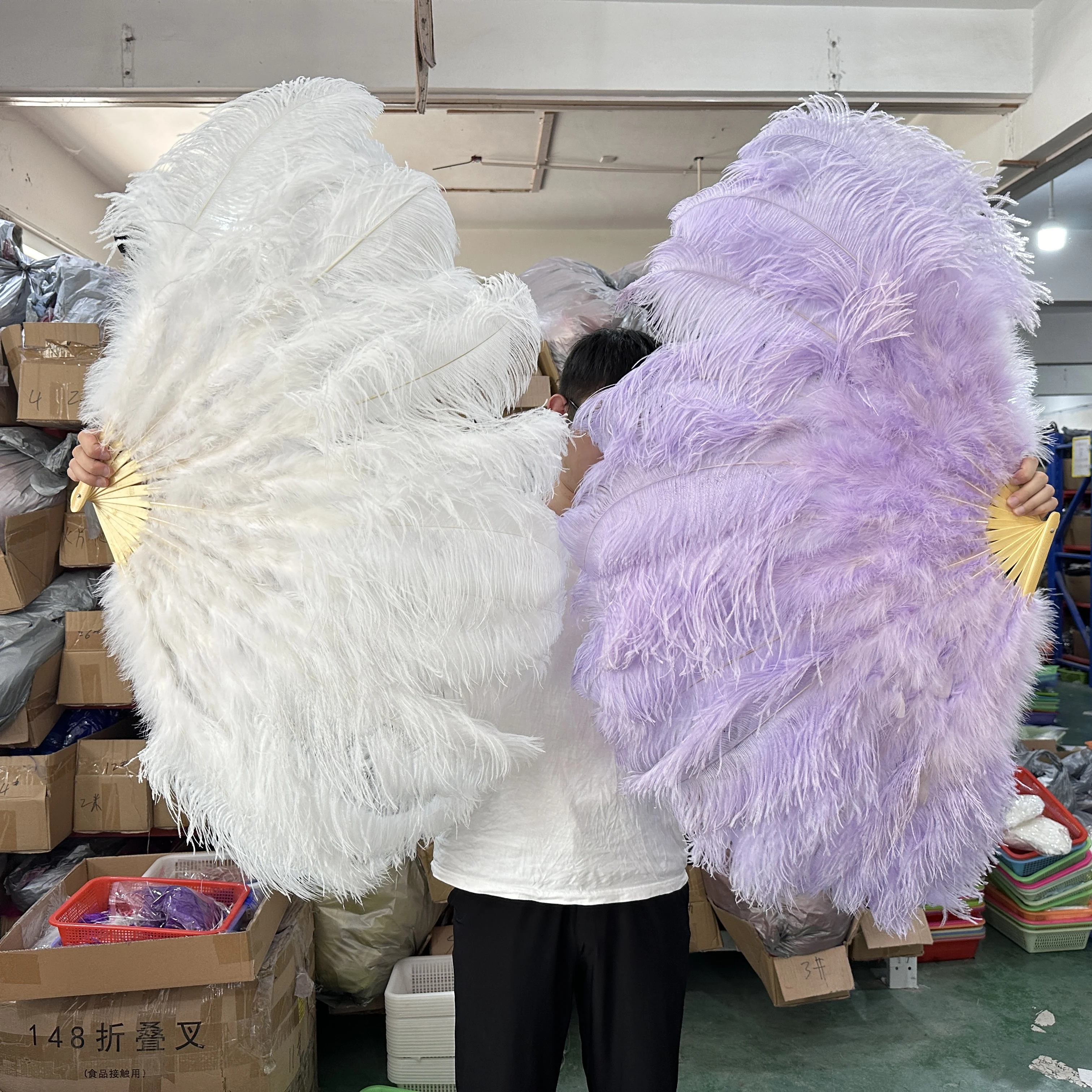 White feather fans wedding | Honestweddingadvice.com