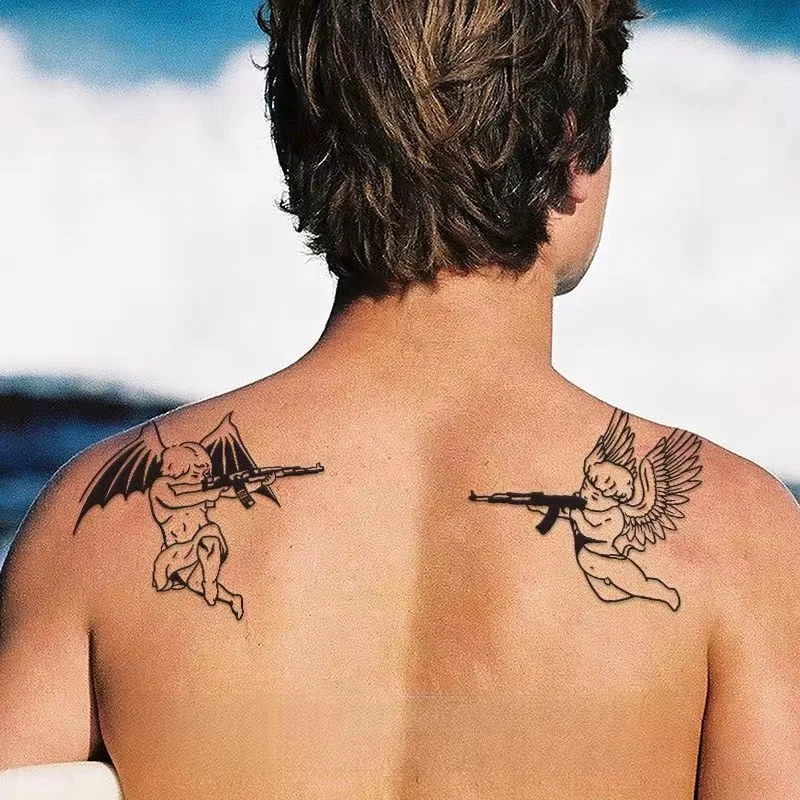 Angel with ak47 tattoo - Bronctattooaus.com