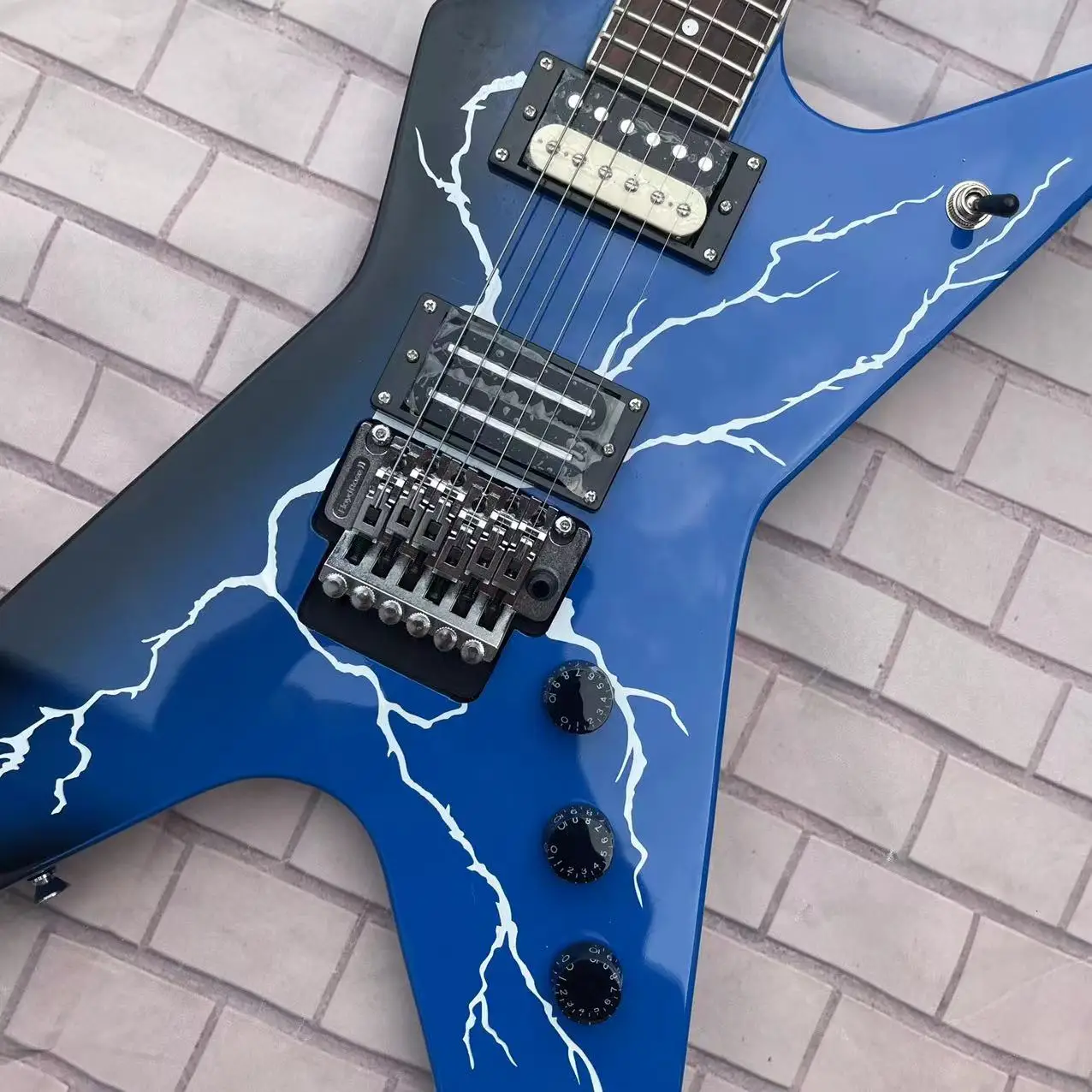 In stock, 6-chord shaped electric guitar, lightning blue body, with ...