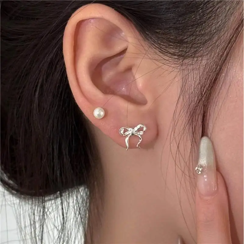 2-Pairs-Crossed-Ear-Studs-Bowknot-Ear-Decorations-Stylish-Ear-Accessory.jpg