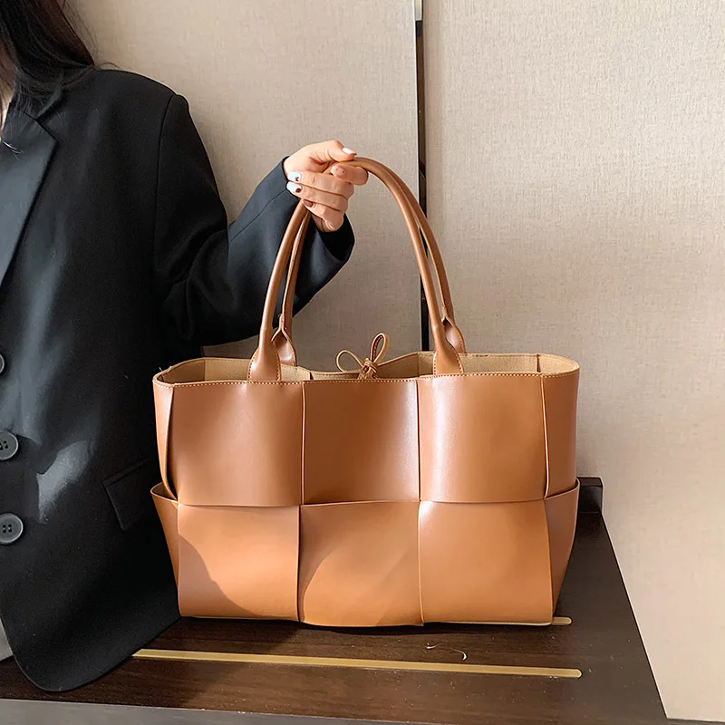 Summer 2022's Newest Bag Trend? The Rubber Bags Vogue