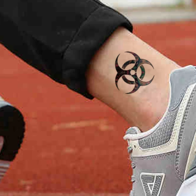 Tribal Biohazard Symbol Tattoo