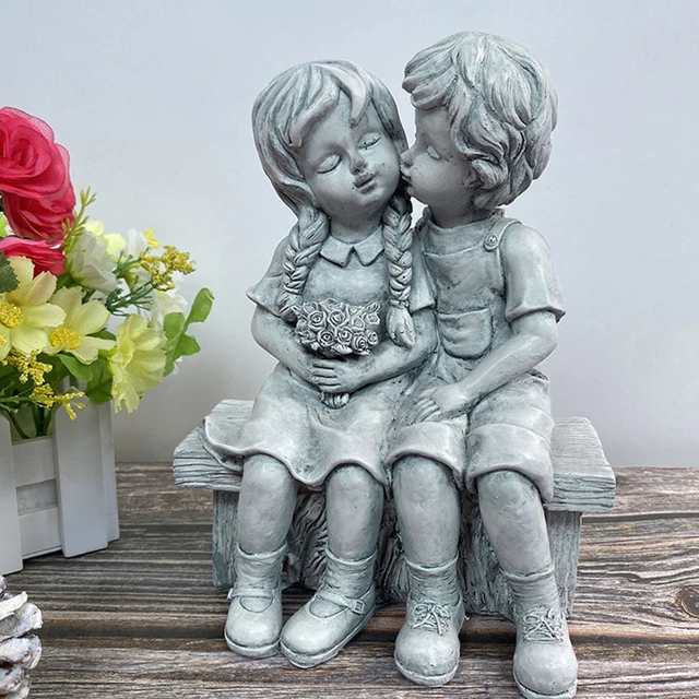 Flower Girl Kissing Boy