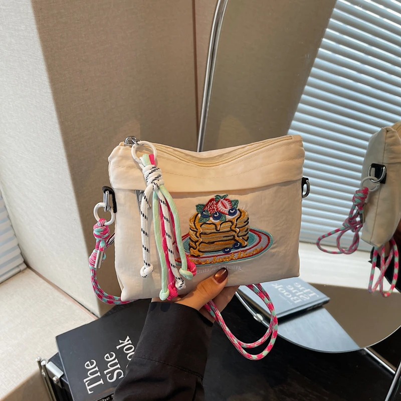 Japanese-style embroidered shoulder bag for women with a unique design ...