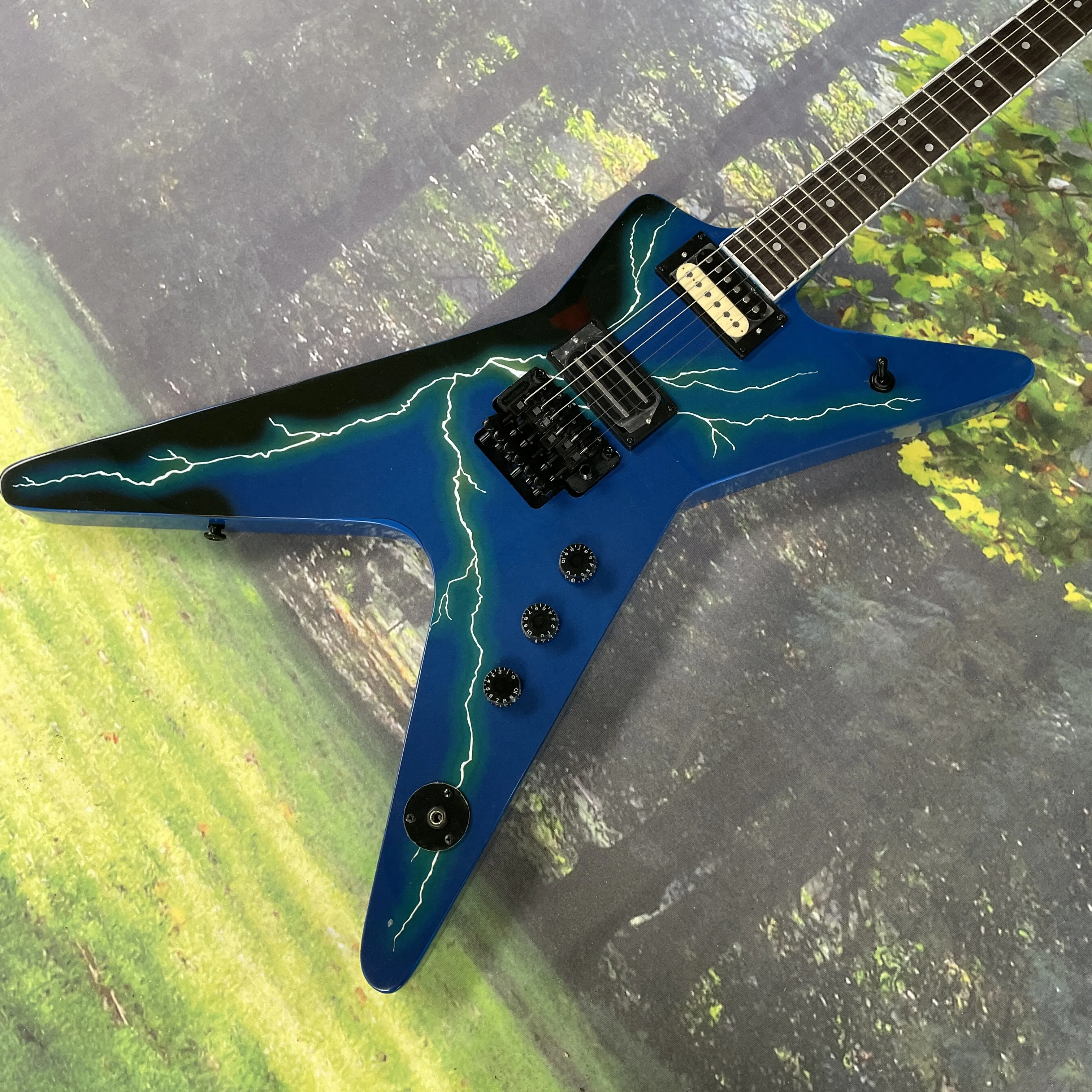 6-string electric guitar, rosewood fingerboard, lightning pattern ...
