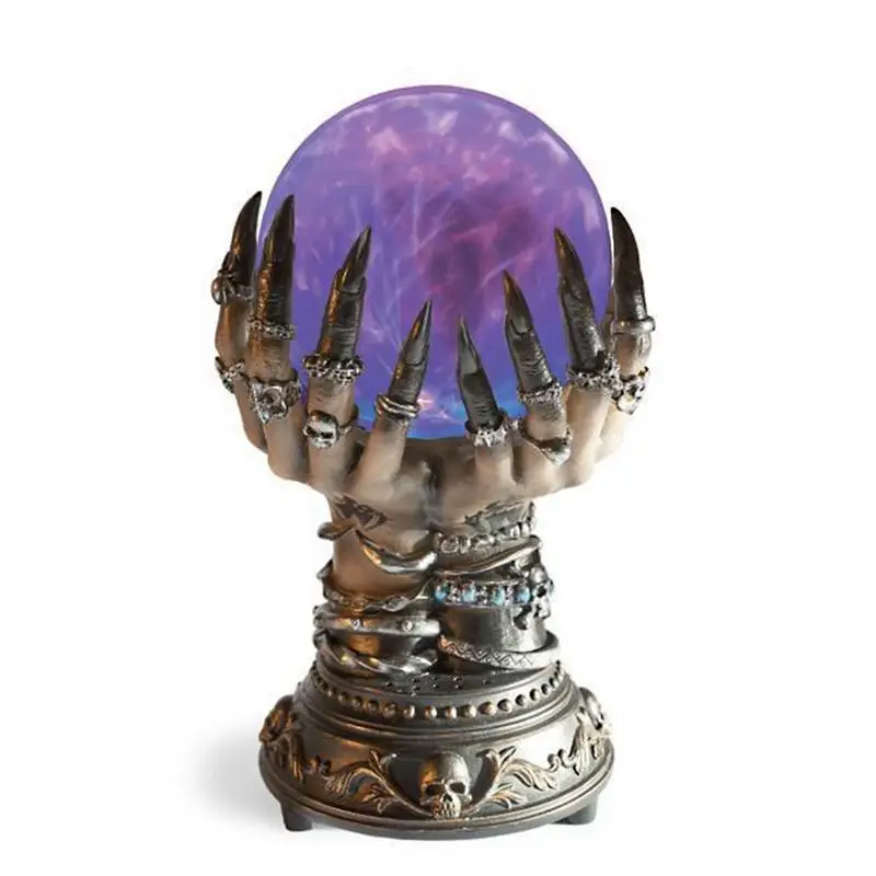 Skeleton Hand Holding Crystal Ball