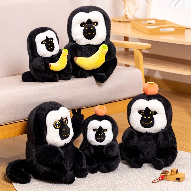 White-faced-Saki-Funny-Monkey-Stuffed-Animal-Holding-Orange-Banana-Posture-Type-Sitting-Black ...
