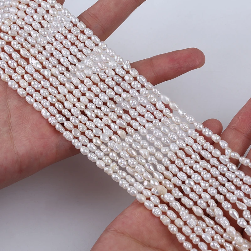 Pearl Strands | Beads - Wholesale 4-5mm Natural White Freshwater Pearl ...