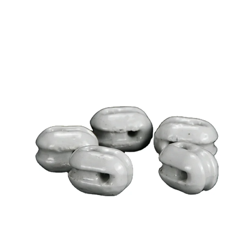 Ceramic-White-Waterproof-Electric-Fence-Steel-Wire-Strain-Egg-Insulator.jpg