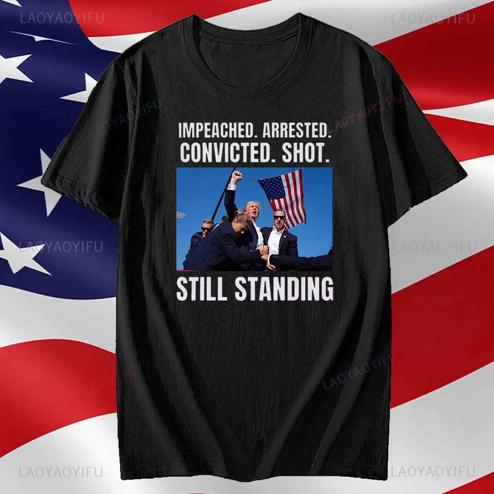 Trump-Shot-Assassination-Attempt-Shirt-Still-Standing-Me-Stronger-Tshir ...
