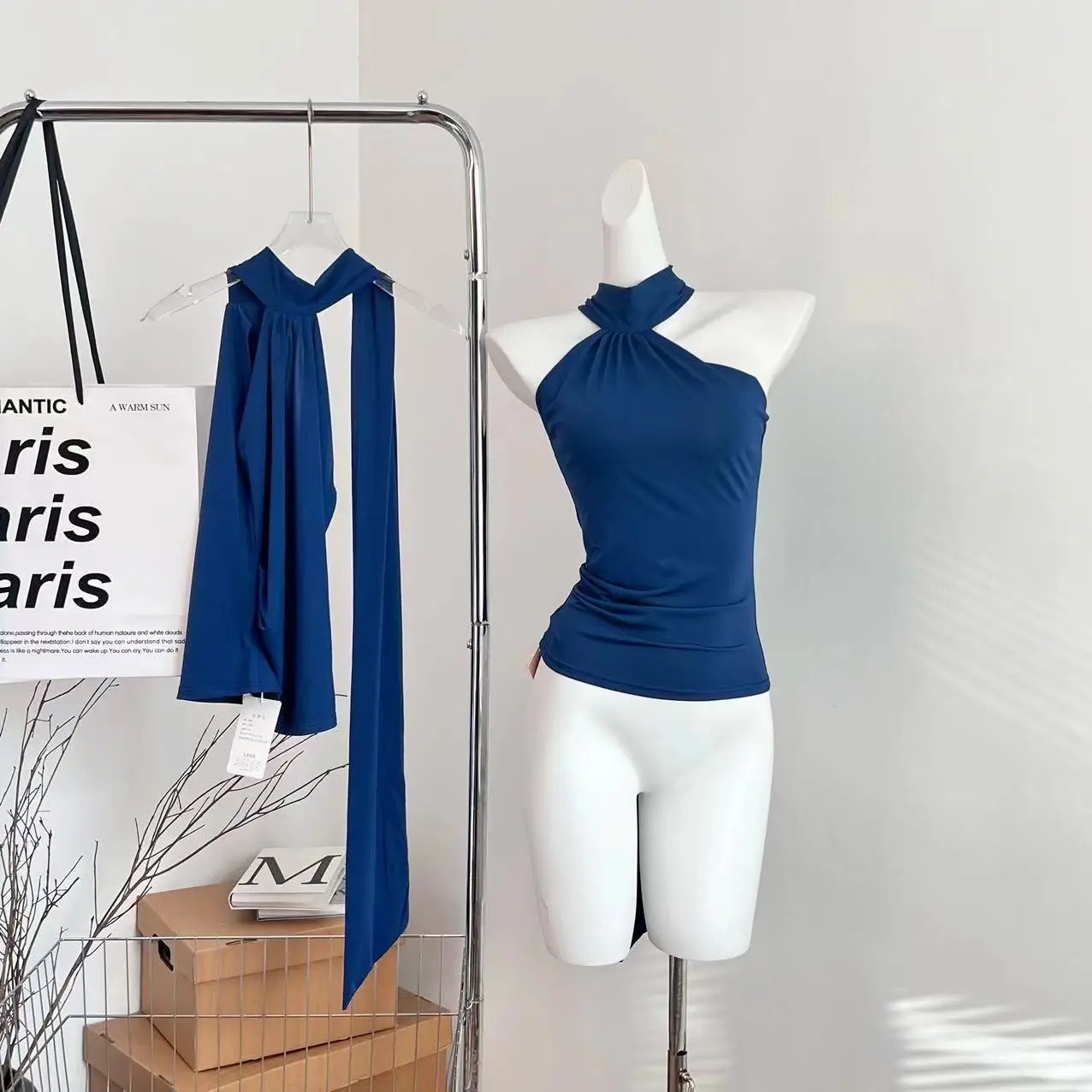 Designed-with-sloping-shoulder-straps-and-a-white-cinched-waist-top ...