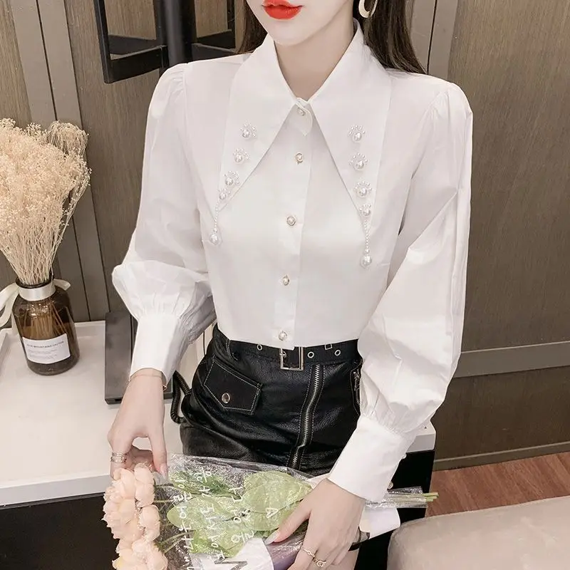 솔리드 컬러 턴 다운 칼라 퍼프 슬리브 셔츠 여성용 심플한 버튼 루즈한 싱글 단추 블라우스 패션 다이아몬드 가을 상품