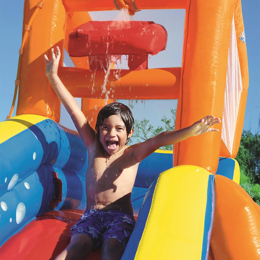 Kids On Inflatable Water Slide