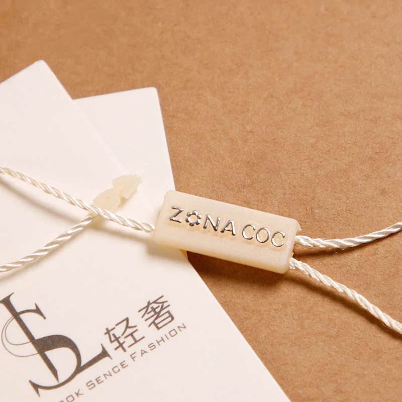 Custom 3d Embossed Brand Name Logo Garment Hangtag String Loop Plastic ...