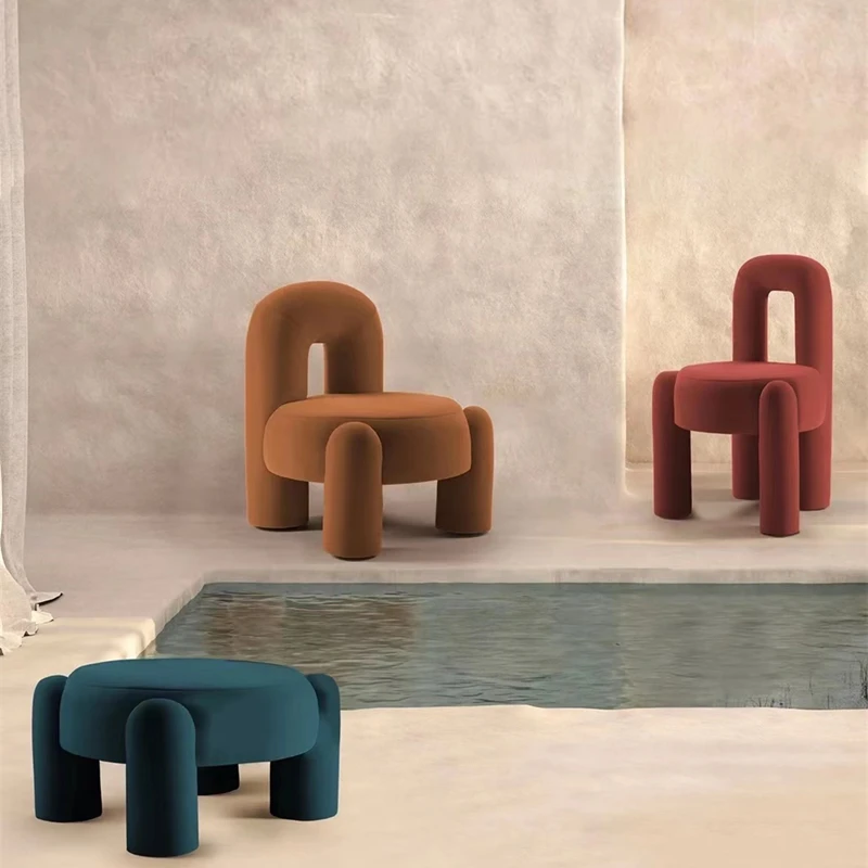 The-cute-little-sofa-stool-in-the-corner-with-fabric-velvet-single ...