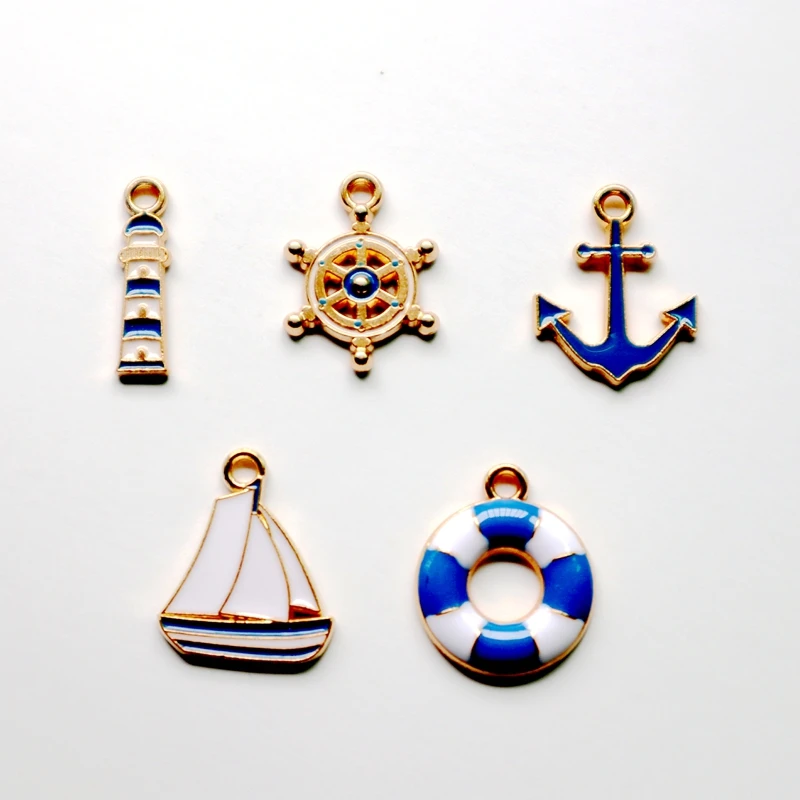 10-pz-Mini-barca-a-vela-ancora-timone-faro-lega-smalto-ciondolo-fai-da ...