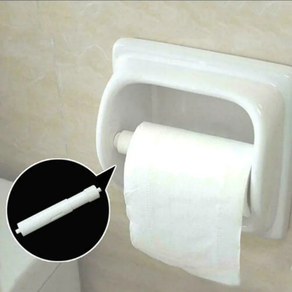 White plastic toilet roll holder store