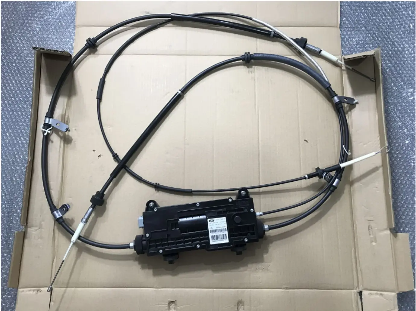 Find the parking brake actuator cable lr023622 lr032104 lr052209 ...