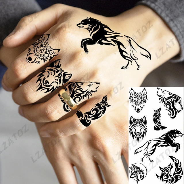 Wolf Finger Tattoo