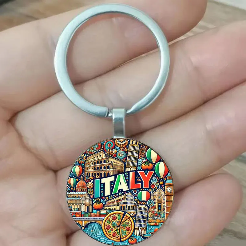 The Italian circular keychain features iconic landmarks and flags ...