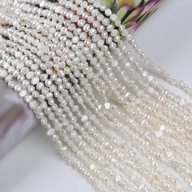 Wholesale-4-5mm-Natural-White-Baroque-Freshwater-Pearls-Strands.jpg