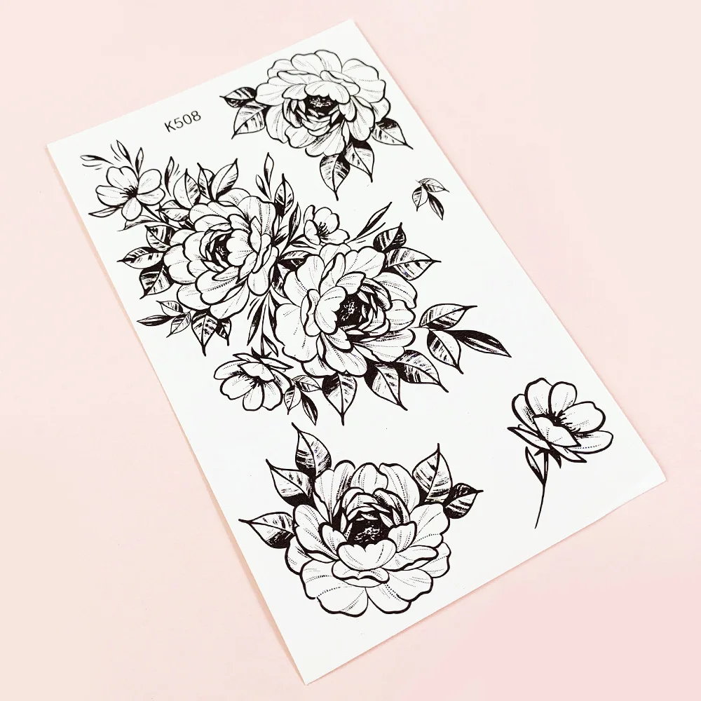 Black And White Rose Tattoos On Arm