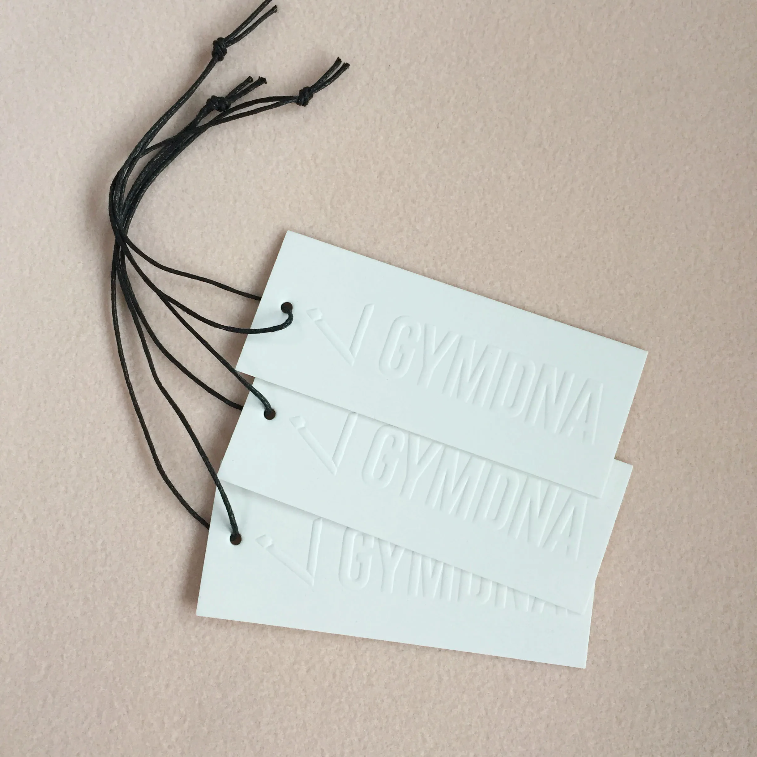 Eco-friendly Custom Embossed Debossed Brand Logo White Pape Swing Hang ...