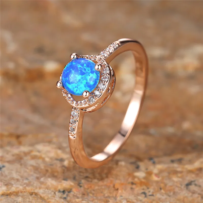 Classic-Four-Claw-Round-Stone-Ring-Blue-Fire-Opal-Engagement-Rings-For-Women-Rose-Gold-Color.jpg