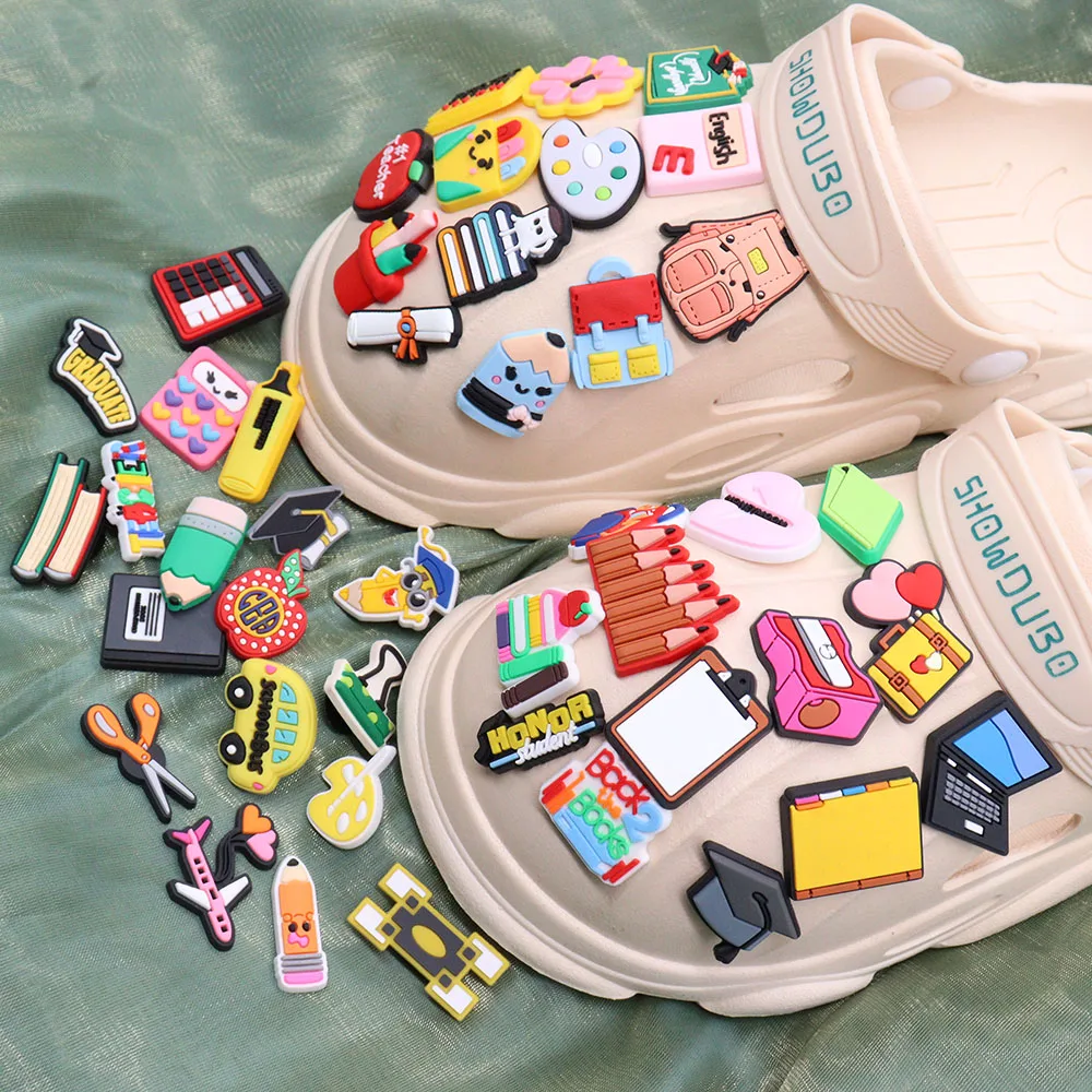 1 44PCS PVC Cartoon Croc Jibz Buckle Book Calculator Laptop Pen ...