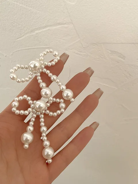 Pendientes de borla de nudo de lazo con cuentas de perlas de imitación ...