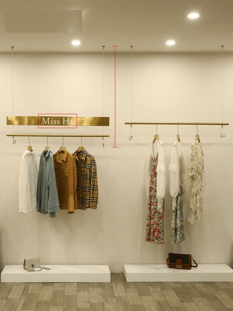 Perchero de exhibición de tienda de ropa, colgador de techo dorado de ...