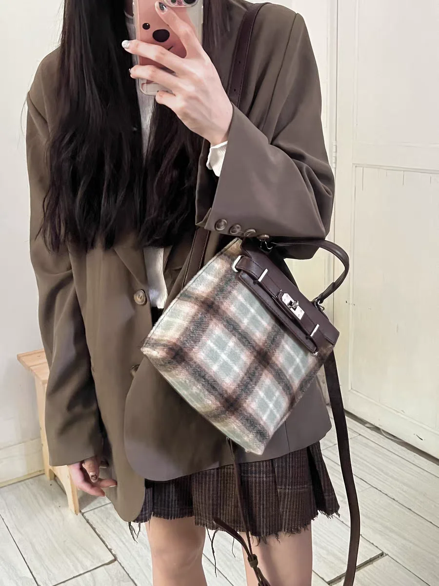 Single-shoulder-diagonal-cross-handbag-with-perforated-shoulder-strap ...