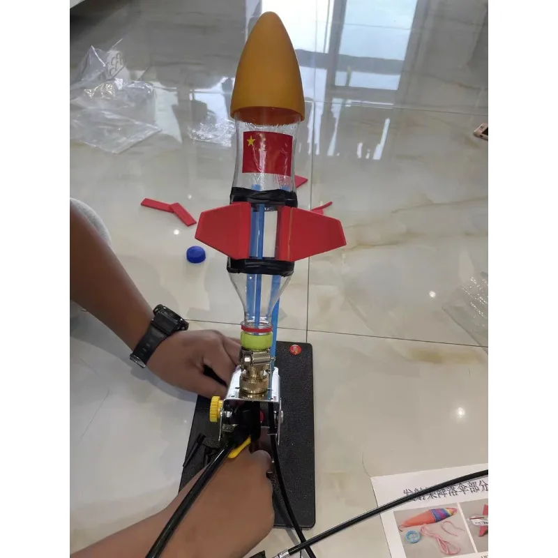 handmade by children DIY Water rocket launcher with parachute, a full ...