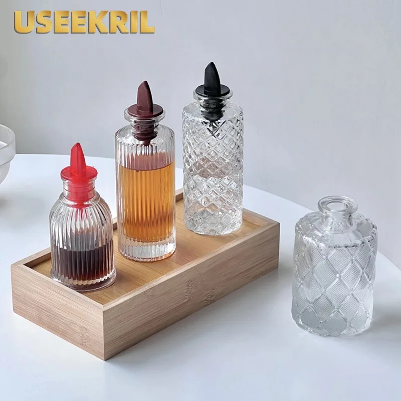 Embossed-Glass-Small-Bottle-With-Lid-Sauce-Bottle-Bitters-Bottles ...