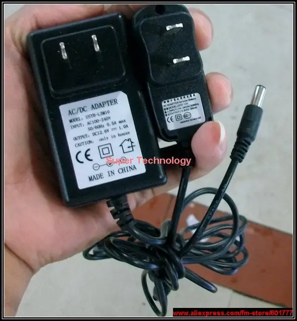 AC adaptoer is the big one ( with 12.6V 1A ) charger on left as above.