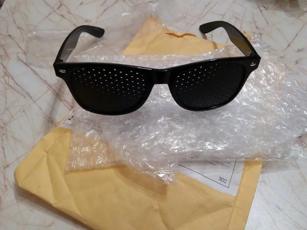 Pinhole Glasses for Eye Protection and Corrective Vision Care