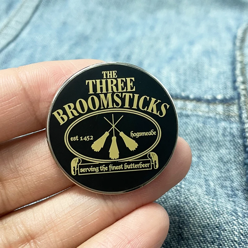 Three Broomsticks Logo